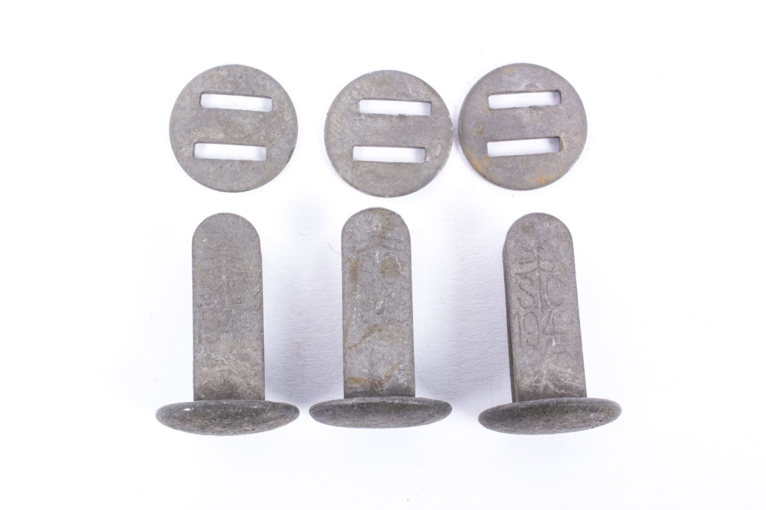 Set of three unissued helmet rivets marked SC 1943 – fjm44
